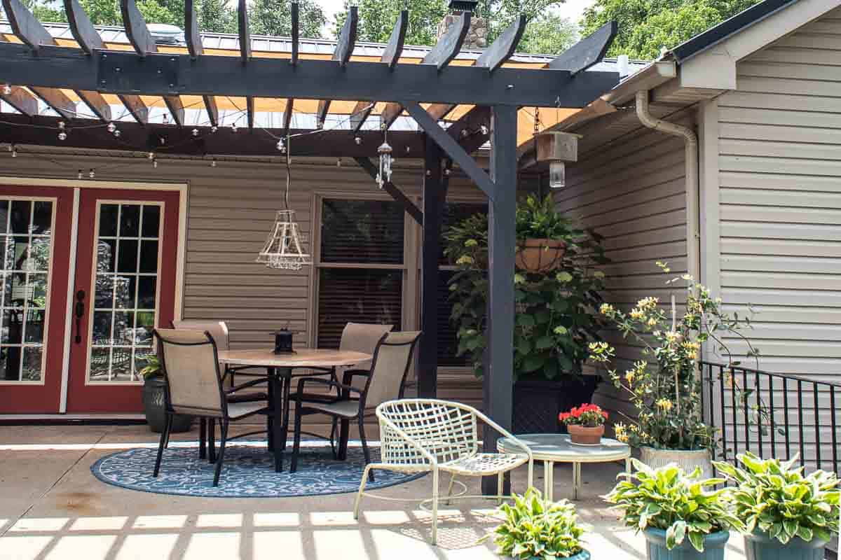How to Install a DIY Sun Shade Sail for a Patio - Reinvented Delaware